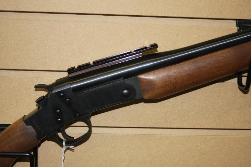 Rossi Combo .243 rifle with 20 GA b... | May Firearms Auction | K-BID